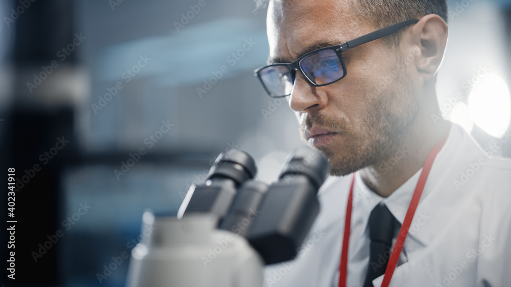 Medical Development Laboratory: Portrait of Caucasian Scientist Looking ...