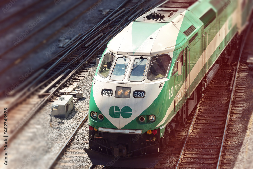 GO train of Metrolinx arriving at Union Station in Toronto, Canada ...
