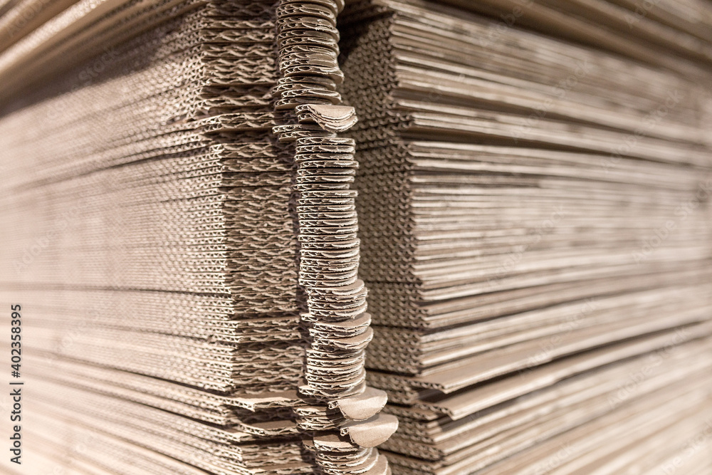 Perforated sheets of corrugated cardboard by stack on pallets - after ...