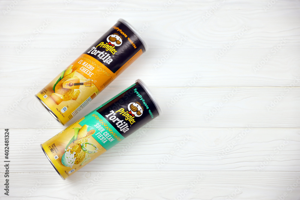 Pringles cylinder tubes with Tortilla el nacho cheese and sour cream ...