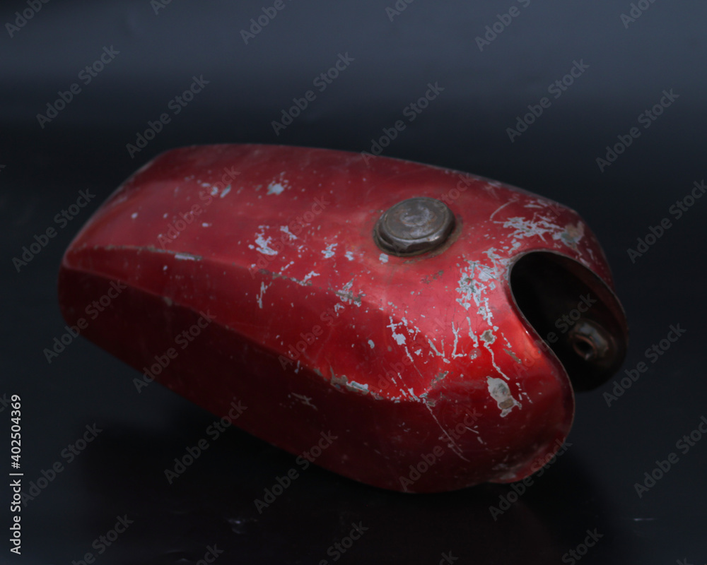 Red tank of a historic motorbike. Motorbike fuel tank Red vintage ...