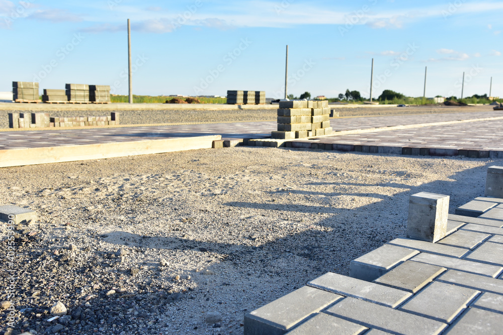 Process of installing paving bricks at construction site. Laying paving ...