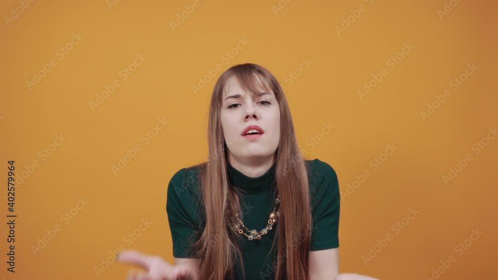 Vídeo do Stock: Confused mood spreads hands wide with doubt face. In ...