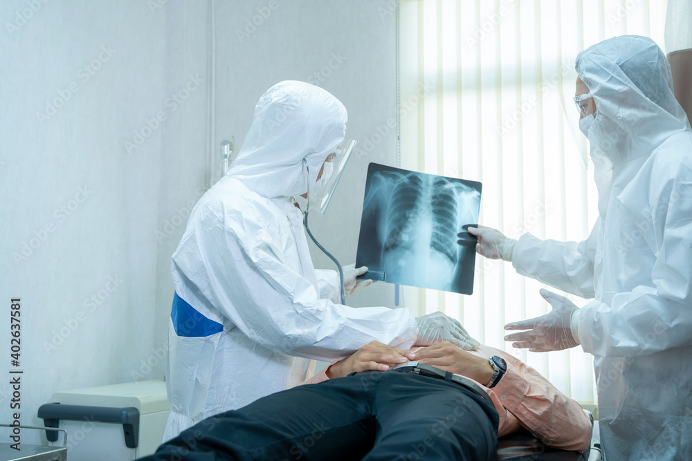 Doctor in hazmat PPE protective clothing wear medical rubber gloves ...