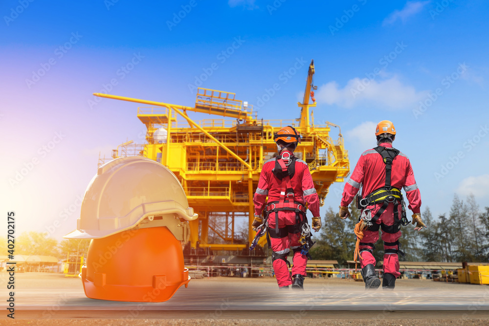 Safety helmet stack on wooden with safety man wear equipment safety ...