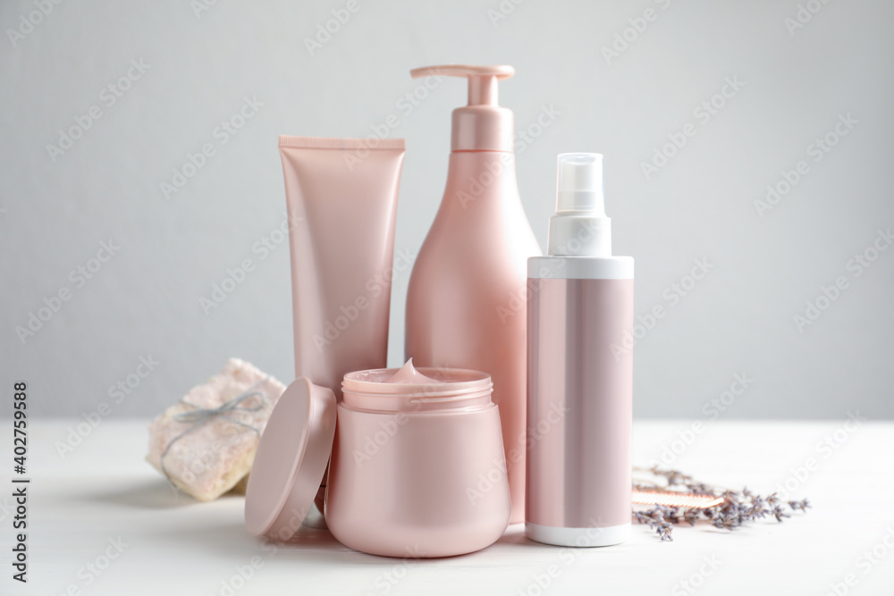 Set of hair care cosmetic products on white table Stock Photo | Adobe Stock
