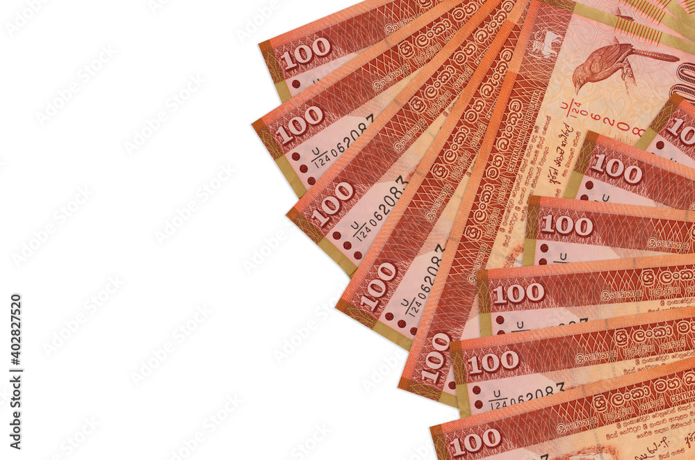 100 Sri Lankan rupees bills lies isolated on white background with copy ...