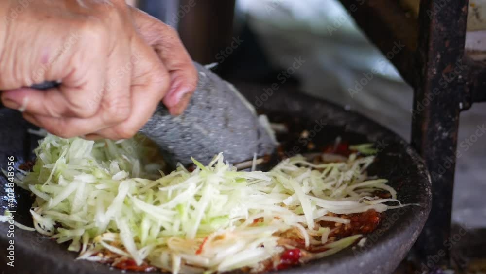 Stockvideon Making mangoes sauces. Sambal Mangga, is a chili sauce ...