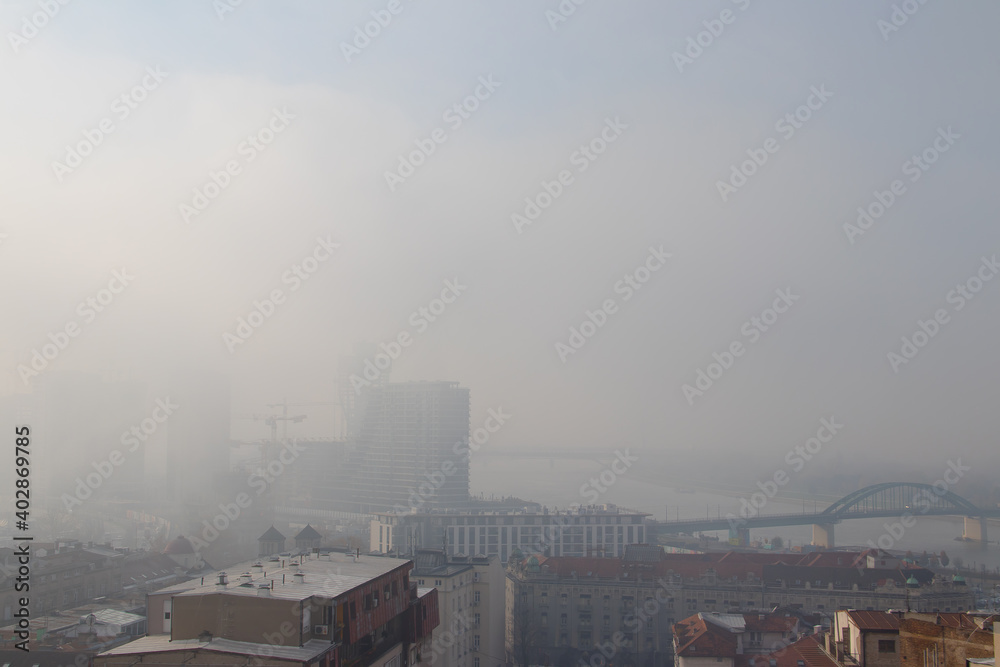 City pollution in foggy Belgrade, capitol of Serbia, industrial ...