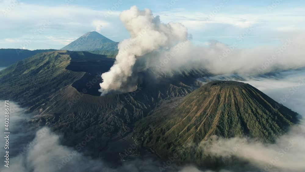 Crater with active volcano smoke in East Jawa, Indonesia. Aerial view ...