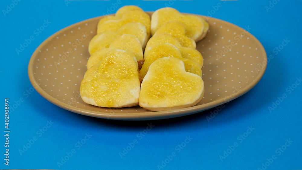 ten pieces of cottage cheese cookies in the shape of a heart on top ...