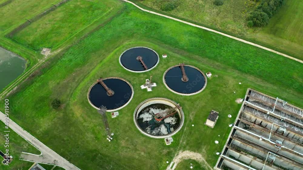 Sewage farm. Static aerial photo looking down onto the clarifying tanks ...