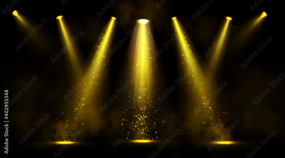 Stage lights, gold spotlight beams with smoke and sparkles on black ...