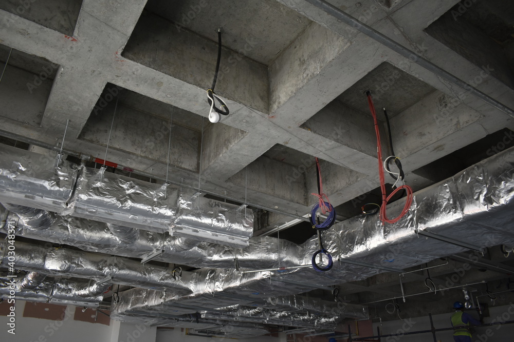 ducting work. duct Insulation. HVAC system in the construction site ...