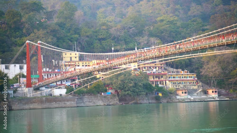 Ram Jhula This long famous pedestrian suspension bridge crossing the ...