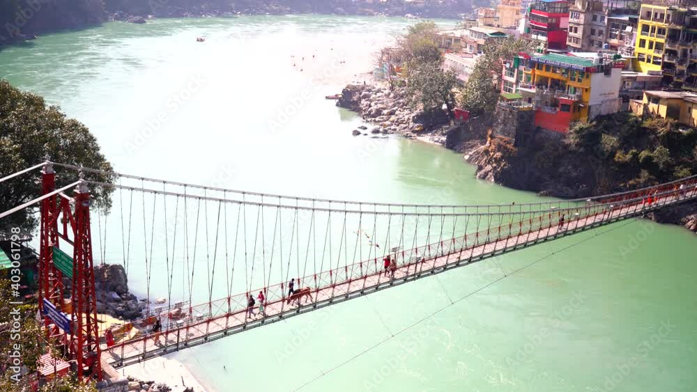 Ram Jhula This long famous pedestrian suspension bridge crossing the ...