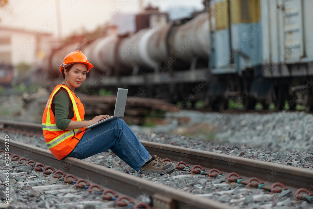 engineer sitting on railway inspection. construction worker Using ...