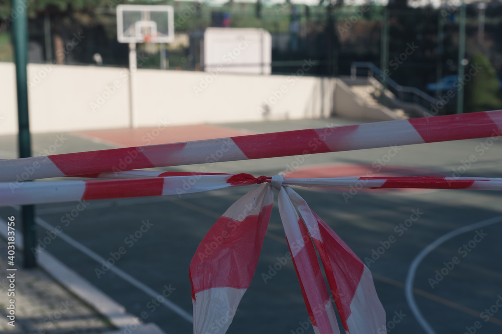 Public open air basketball court closed with red tape due to ...