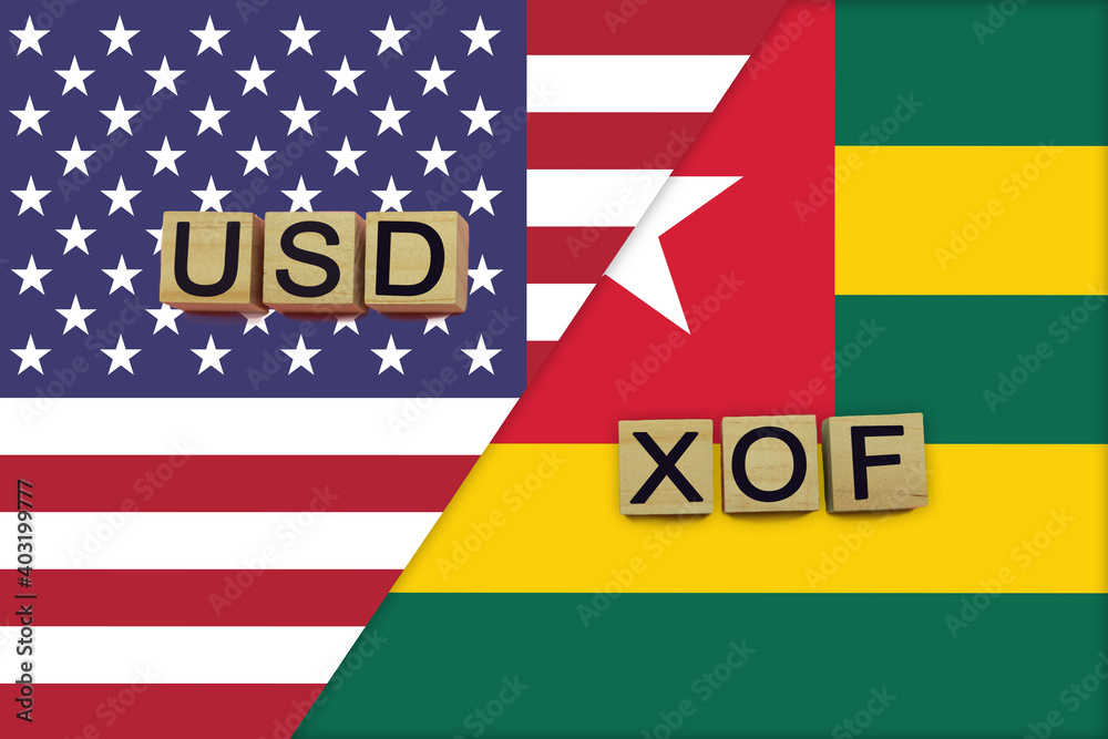 USA and Togo currencies codes on national flags background Stock Photo ...