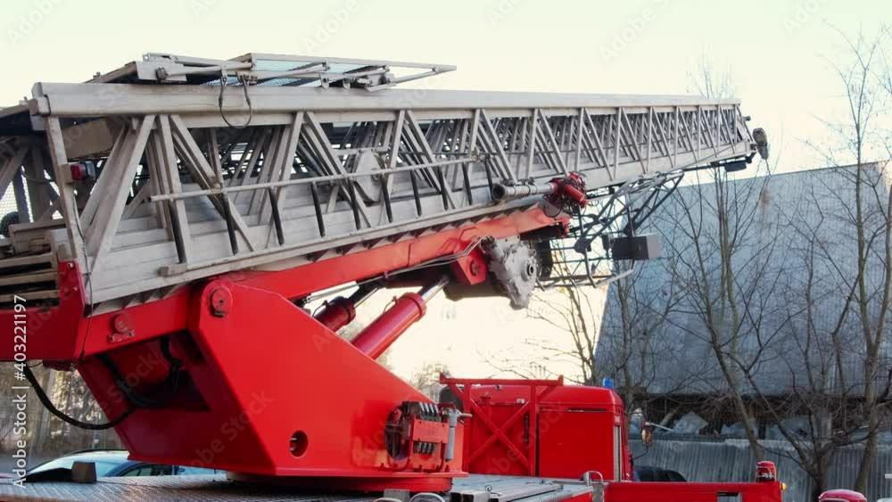 A ladder used by firefighters in a fire truck during a fire. Stock ...