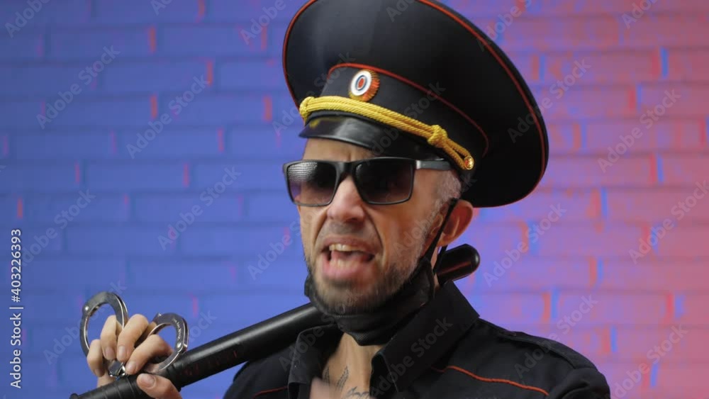 a man in a military uniform of the Russian police with a coronavirus ...