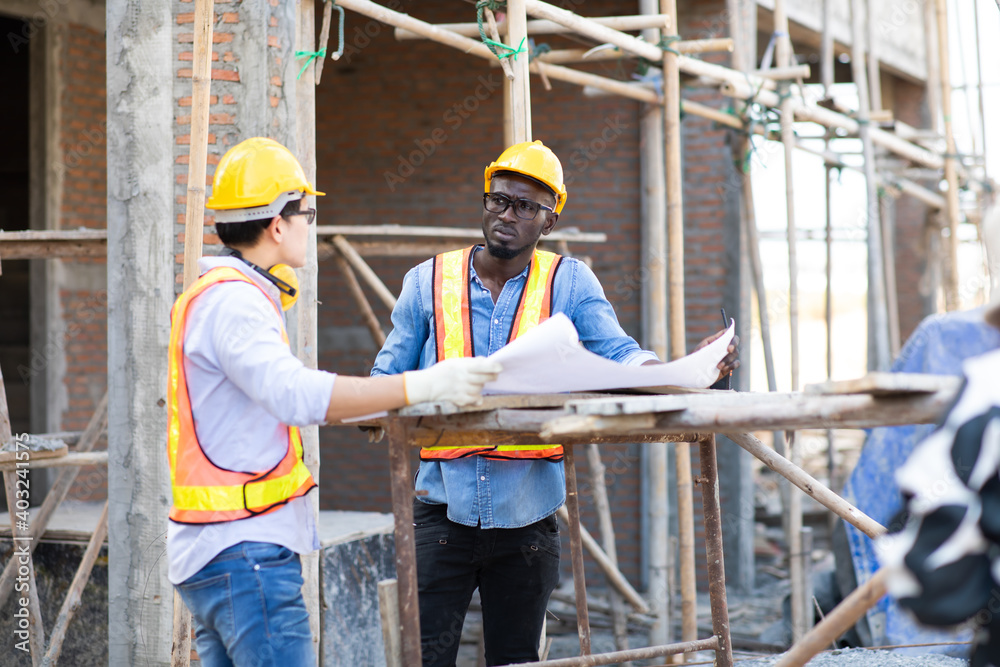 Professional Construction and Engineer team Working on workplace ...