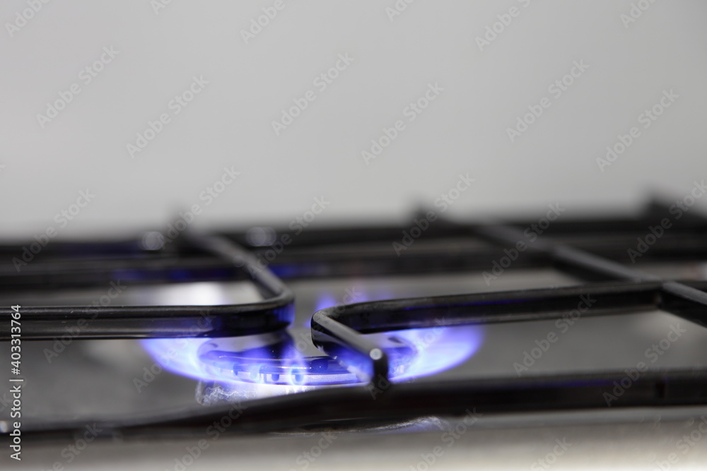Stainless steel gas stove hob fith blue flame, kitchen indoor fire ...