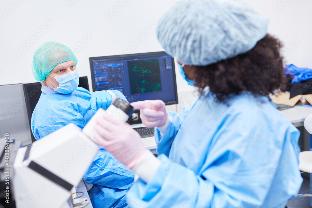 Researchers talk about results of experiment in the laboratory Stock ...