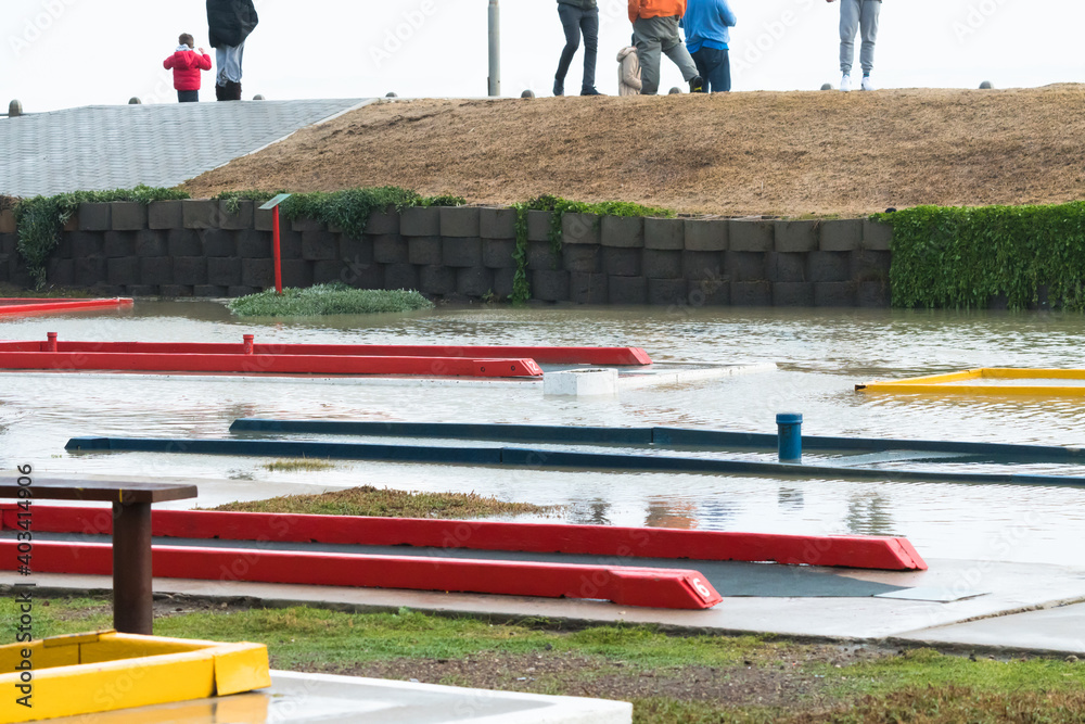 putt putt course or mini golf course flooded with rain water concept ...