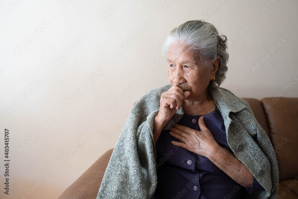Asian senior ill female have a cough and sore throat. Causes of cough ...
