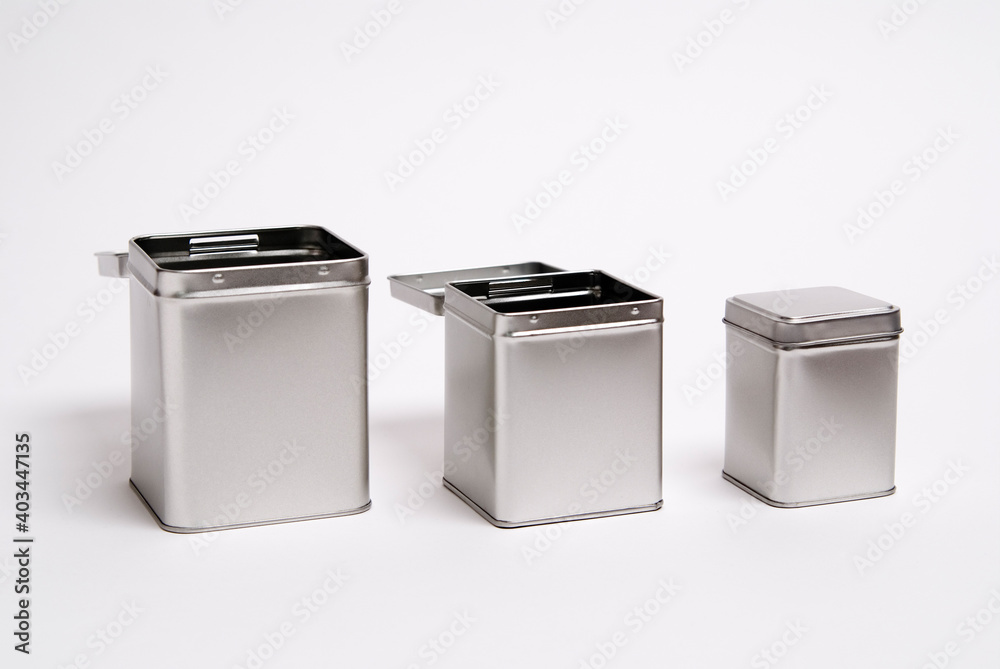 Drei Metalldosen in verschiedenen Größen Stock Photo | Adobe Stock