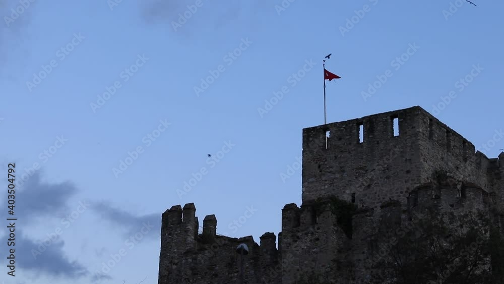 Flapping Turkish Flag On Top Of The Anatolian Fortress And Birds Flying ...