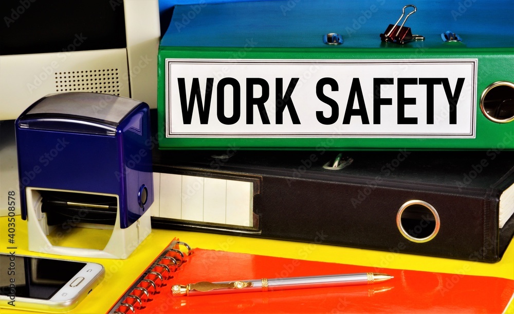 Work safety. Text label on the folder. Monitoring the state of working ...