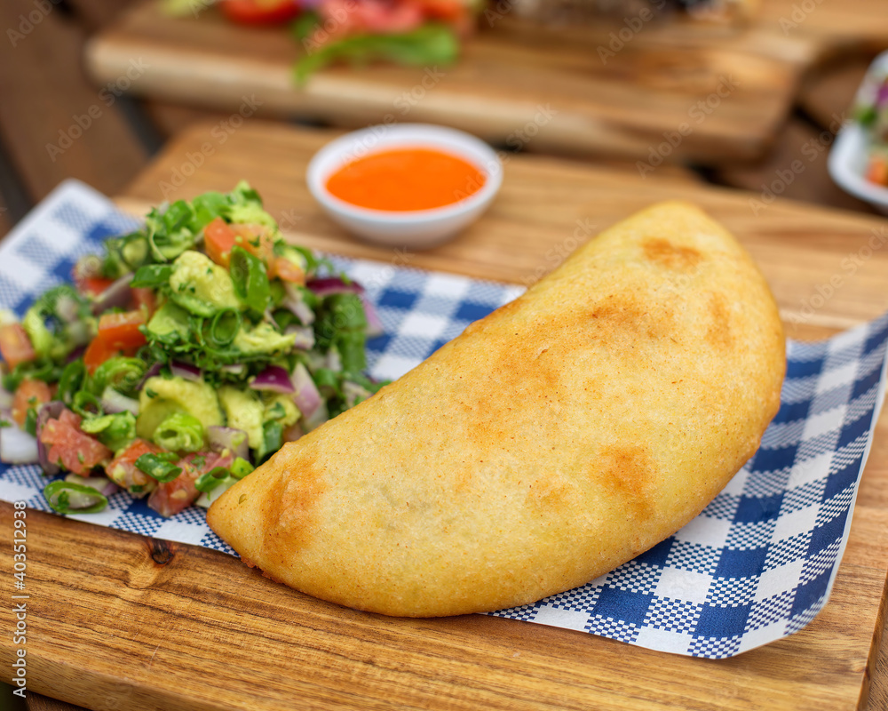 An empanada is a type of baked or fried turnover consisting of pastry ...