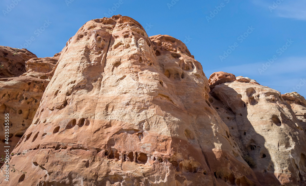 Golden sandstone geographical formations with a desert prairie ...