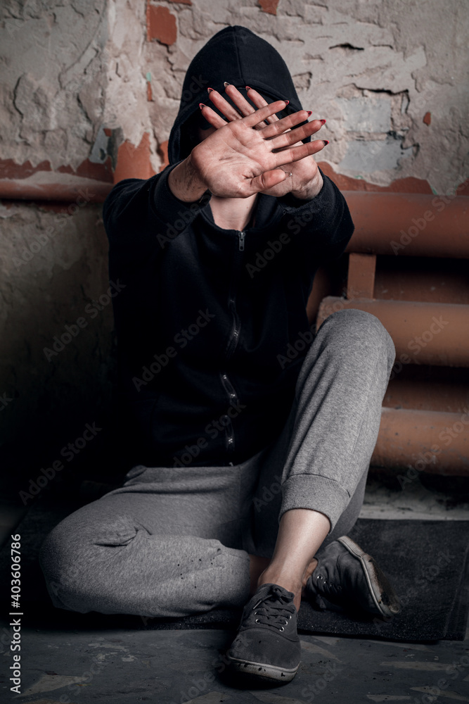 The concept of drug addiction and homelessness. A depressed and ...