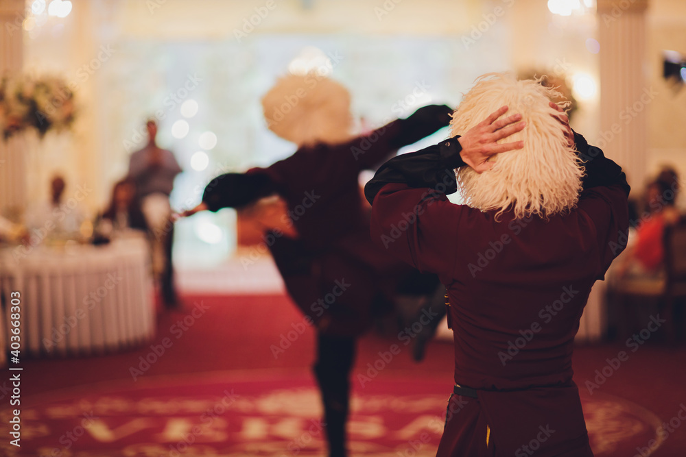 Dancing boy and girl in traditional costume of Georgia. Stock Photo ...