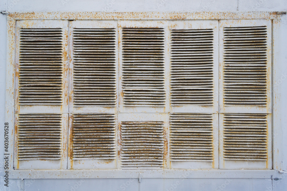 Old rusty ventilation shaft background texture. gills mesh air intake ...
