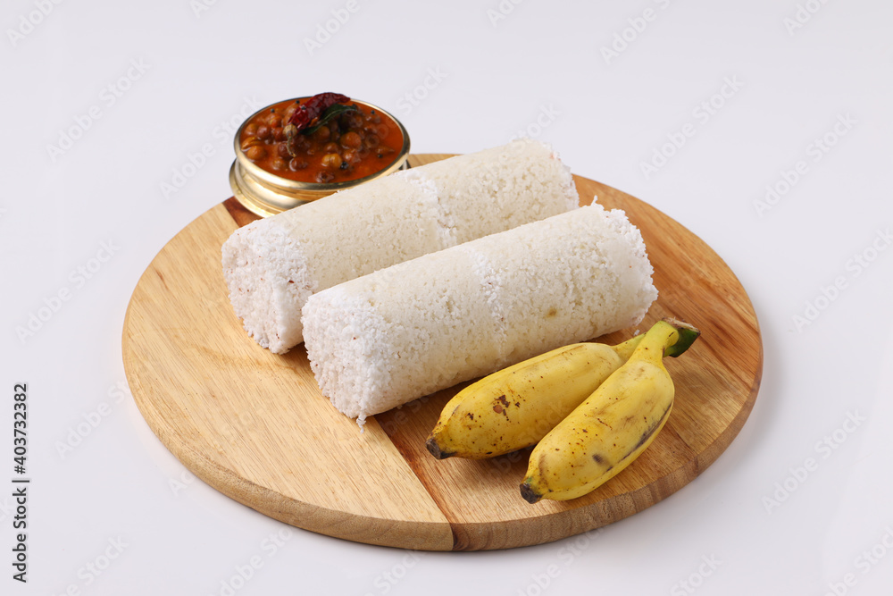 White rice puttu with chana curry Stock Photo | Adobe Stock