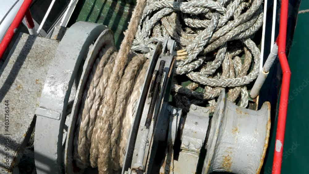 Old cargo ferry equipment with sea wave background in tropical area ...