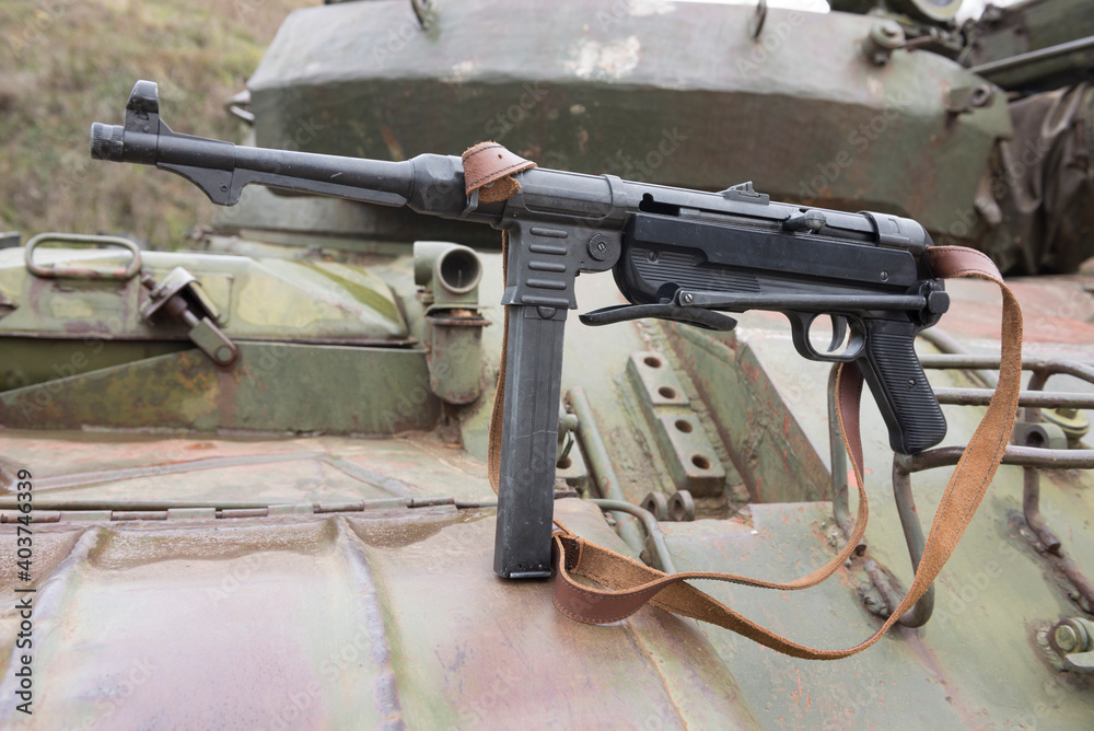 German submachine gun on the armor of the tank Stock Photo | Adobe Stock