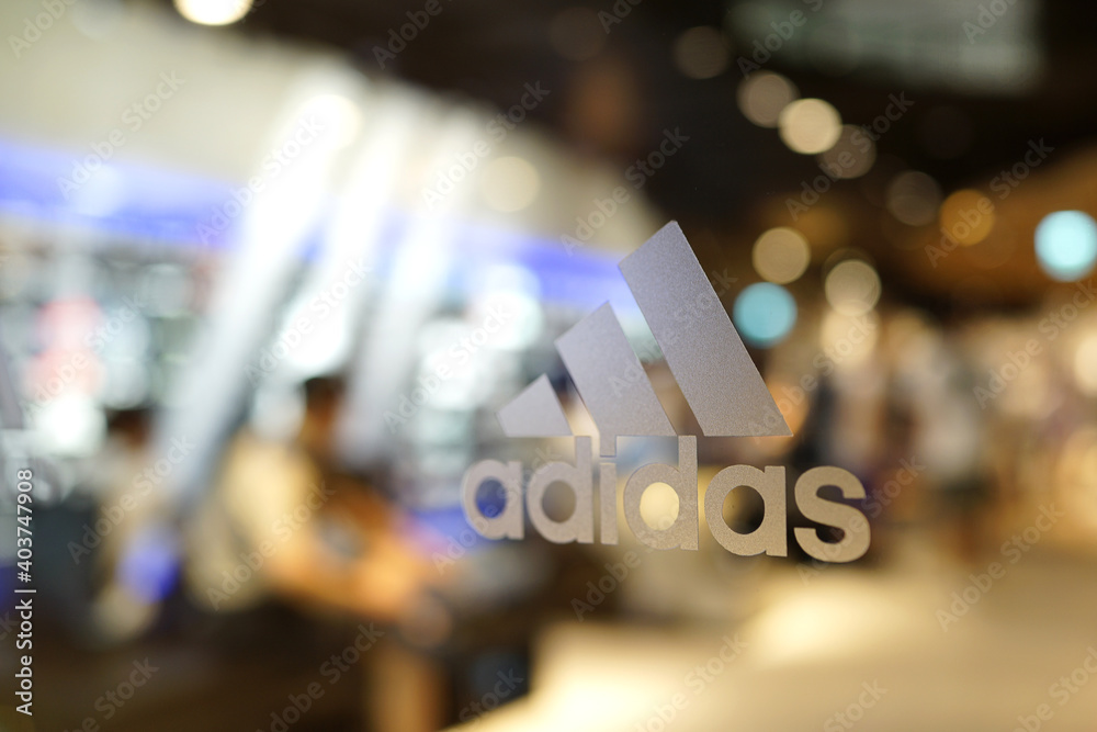 Adidas retail store sign in Taipei 101 Mall, Taiwan. Adidas is a German ...