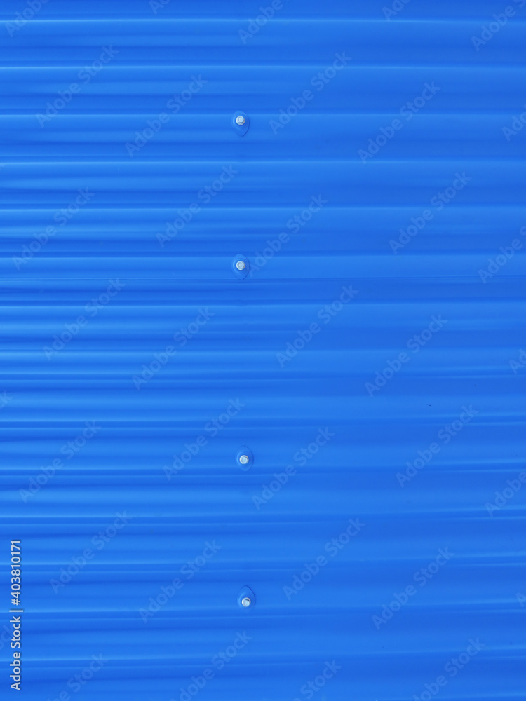 Blueish metallic corrugated sheet roof texture. Deep blue profiled ...