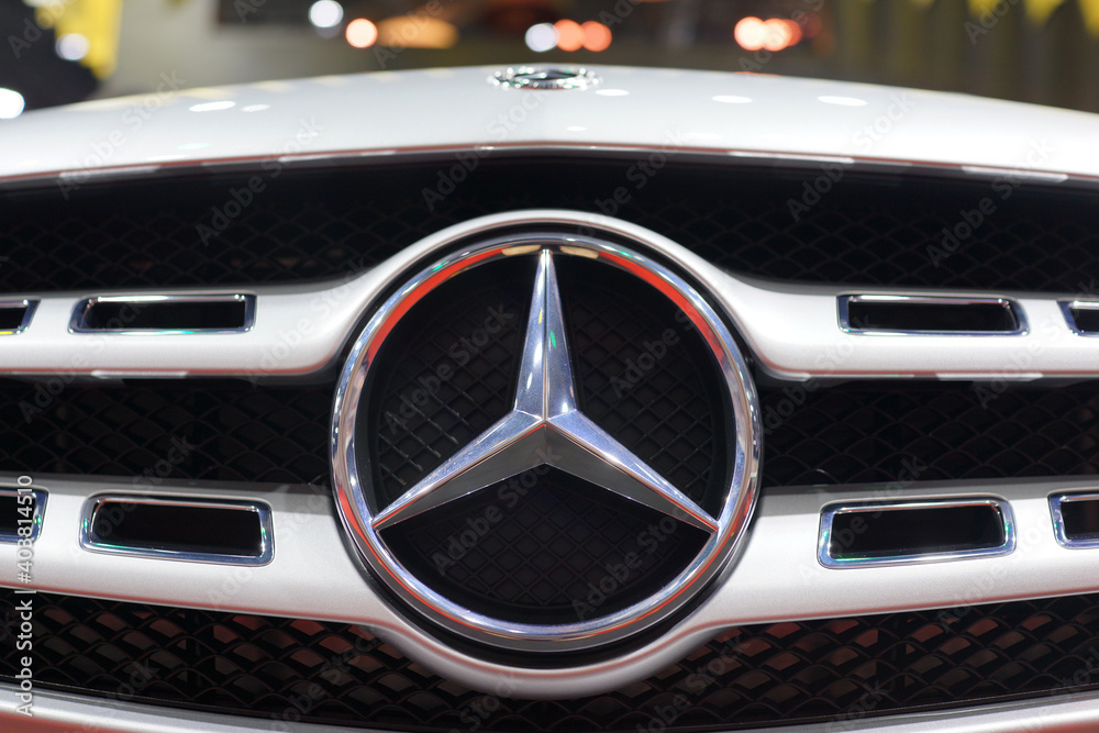 Front view logo sign of a Mercedes Benz, compact luxury car line ...