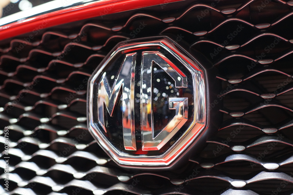 Front grille of MG car logo at Bangkok Motor Show. MG is a British ...