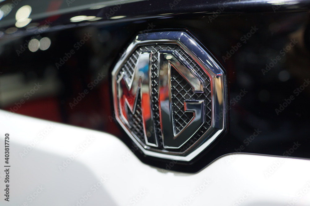 Front grille of MG car logo at Bangkok Motor Show. MG is a British ...