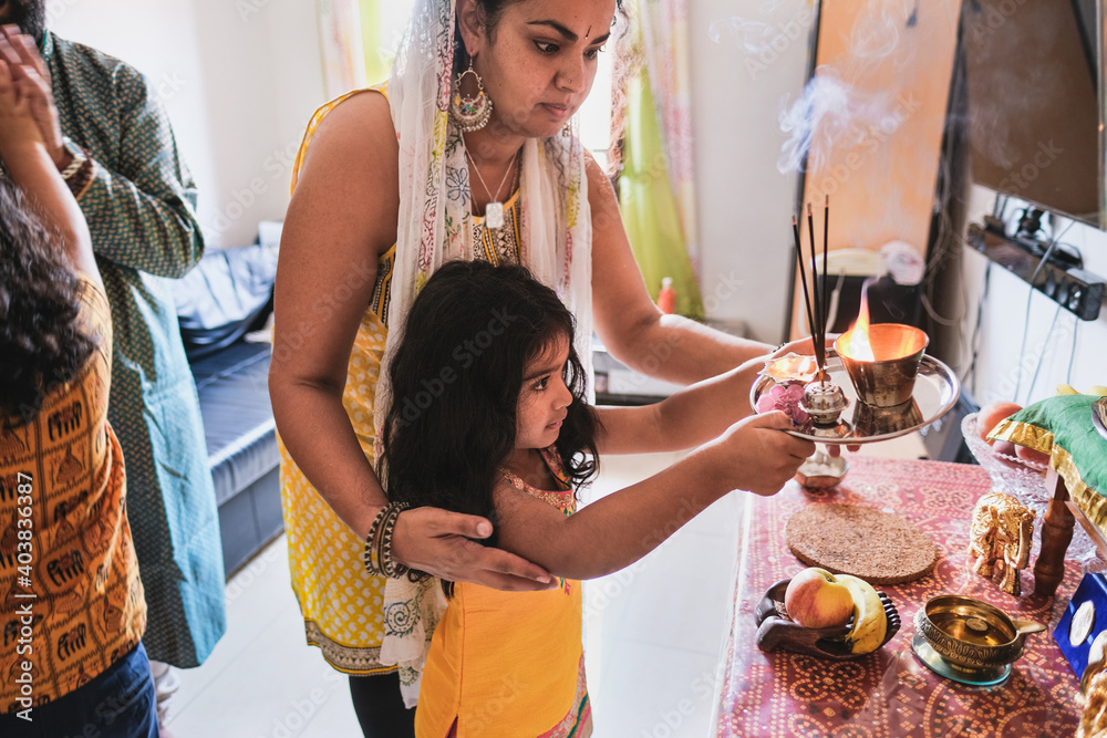 Indian family celebrate hindu event together at home - Traditional ...