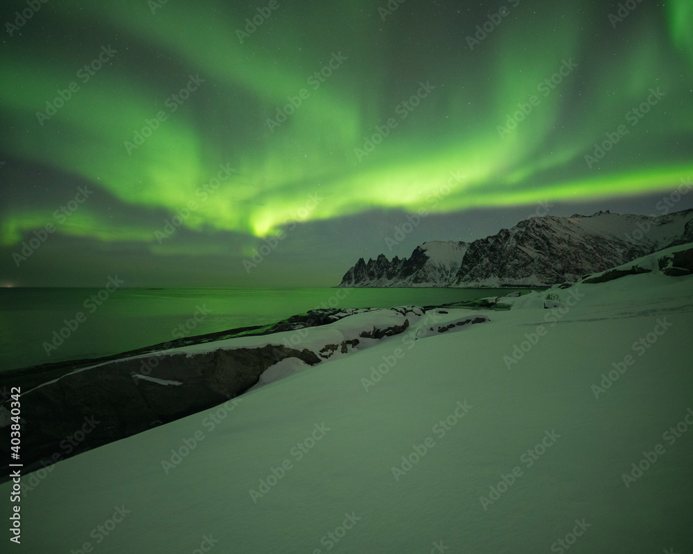 Northern lights - Aurora Borealis shine in sky above Tungeneset ...