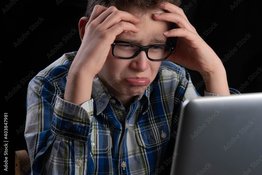 Pupil crying at computer homeschooling Stock Photo | Adobe Stock