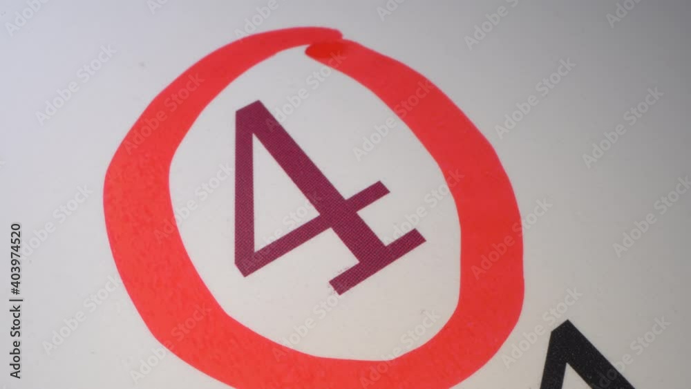4 - Marking the date in the calendar with a red marker. The fourth day ...